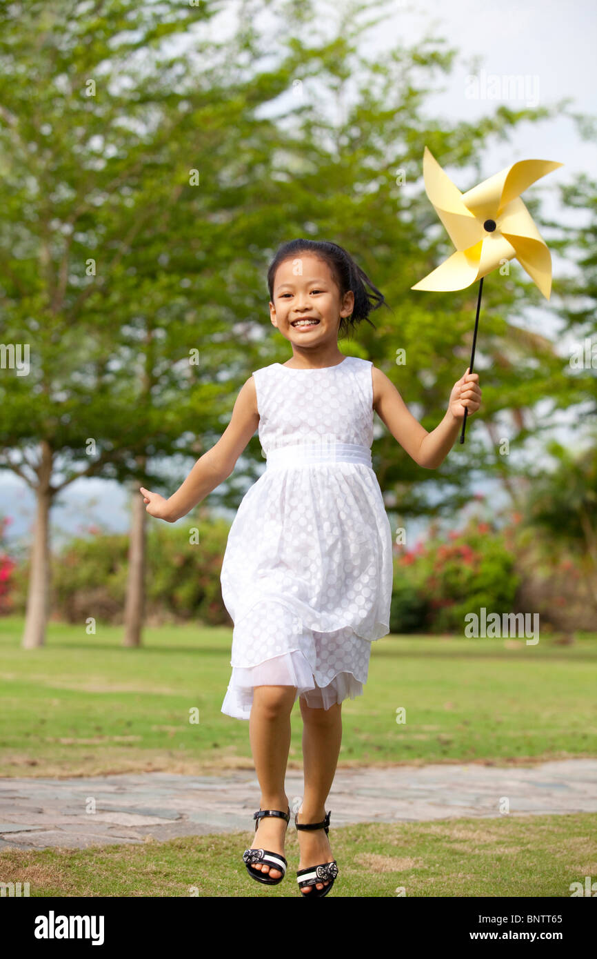 Girl With A Pinwheel High Resolution Stock Photography and Images - Alamy