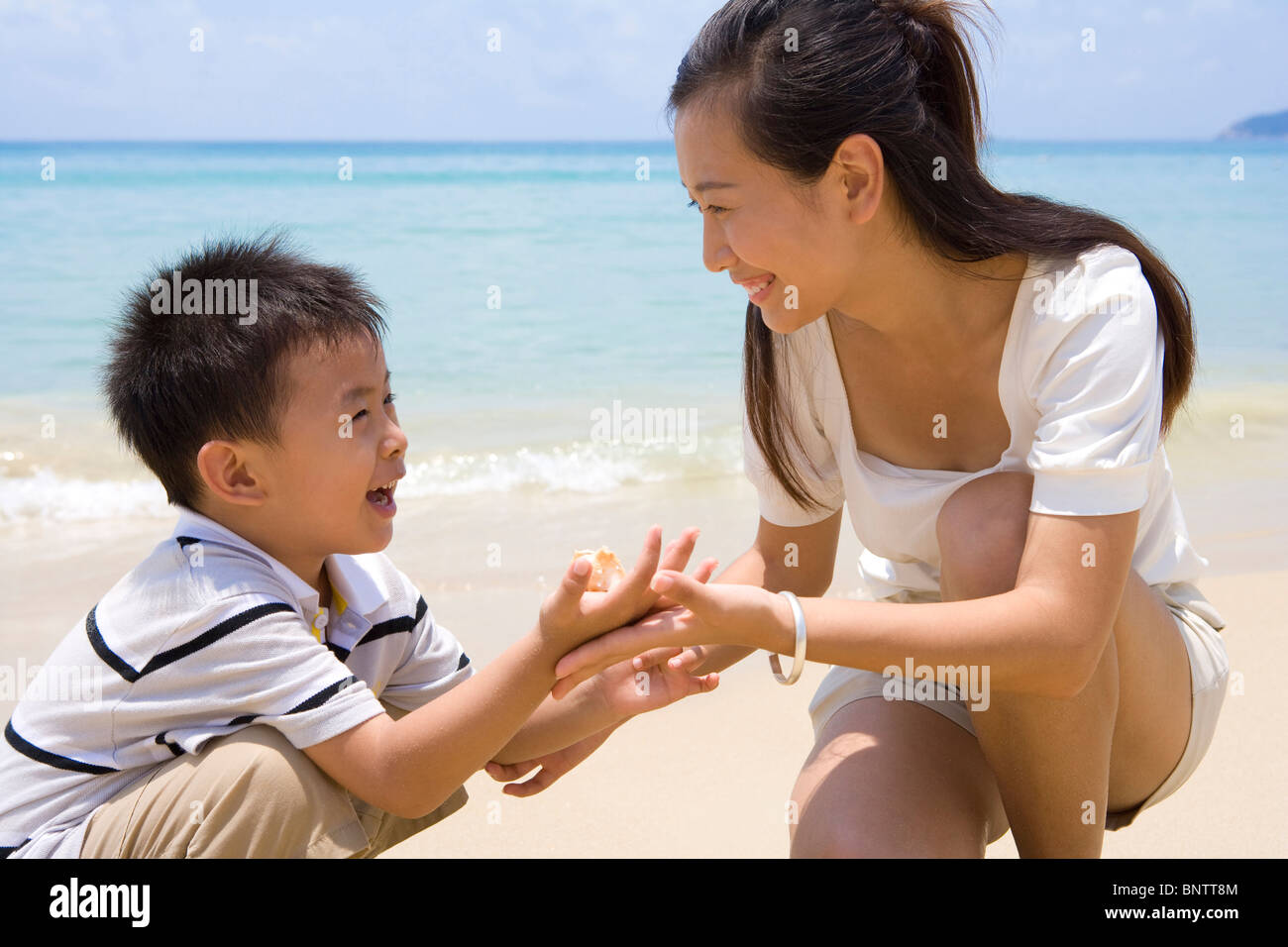 Mother and son at the beach Stock Photo - Alamy