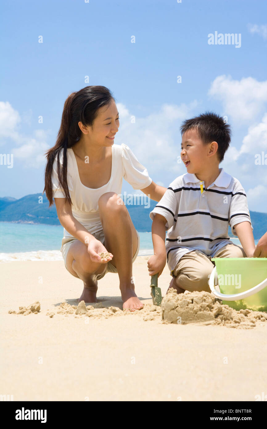 Mother and son at the beach Stock Photo - Alamy