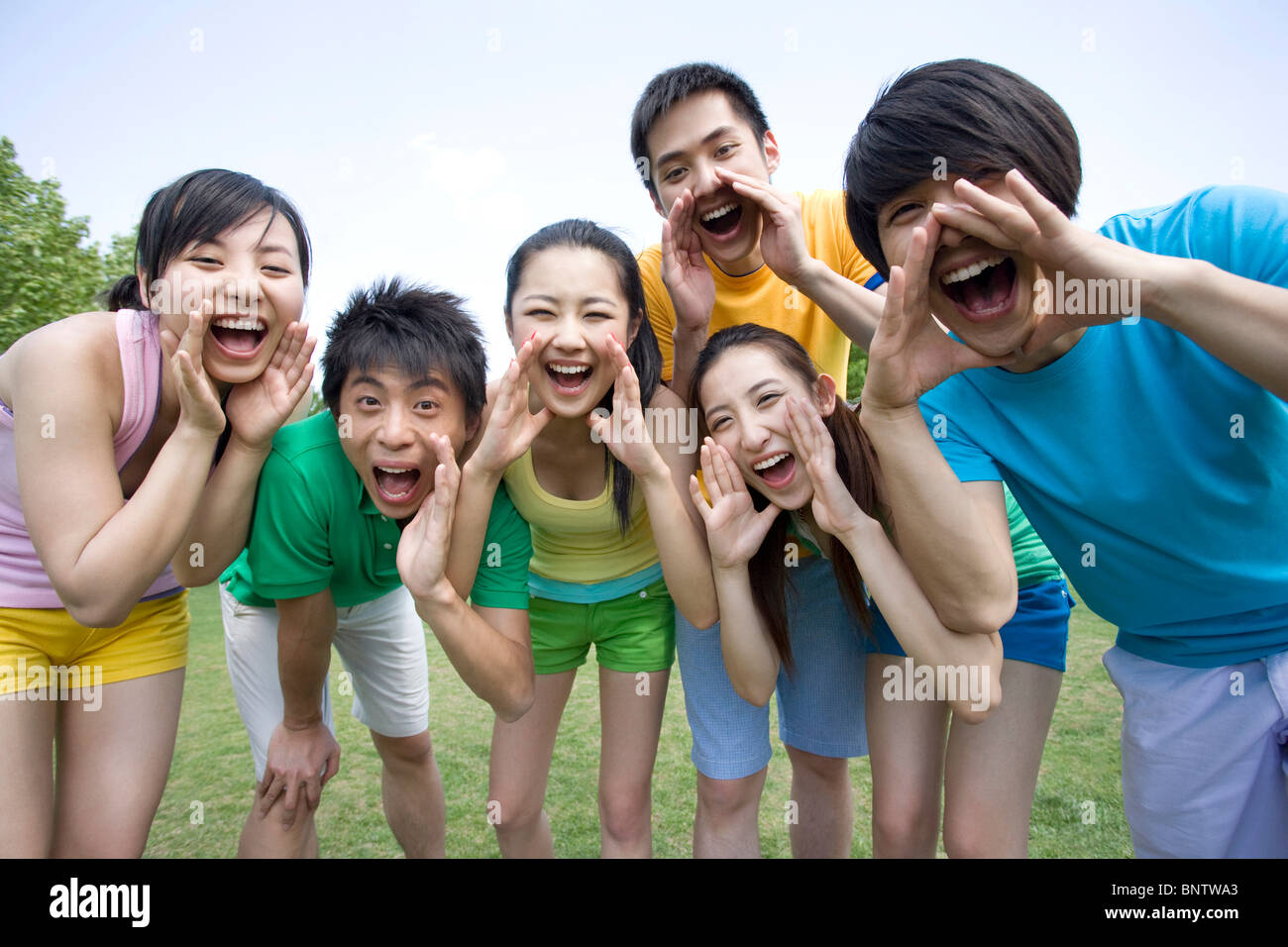 Portrait of a group of friends at the park Stock Photo - Alamy