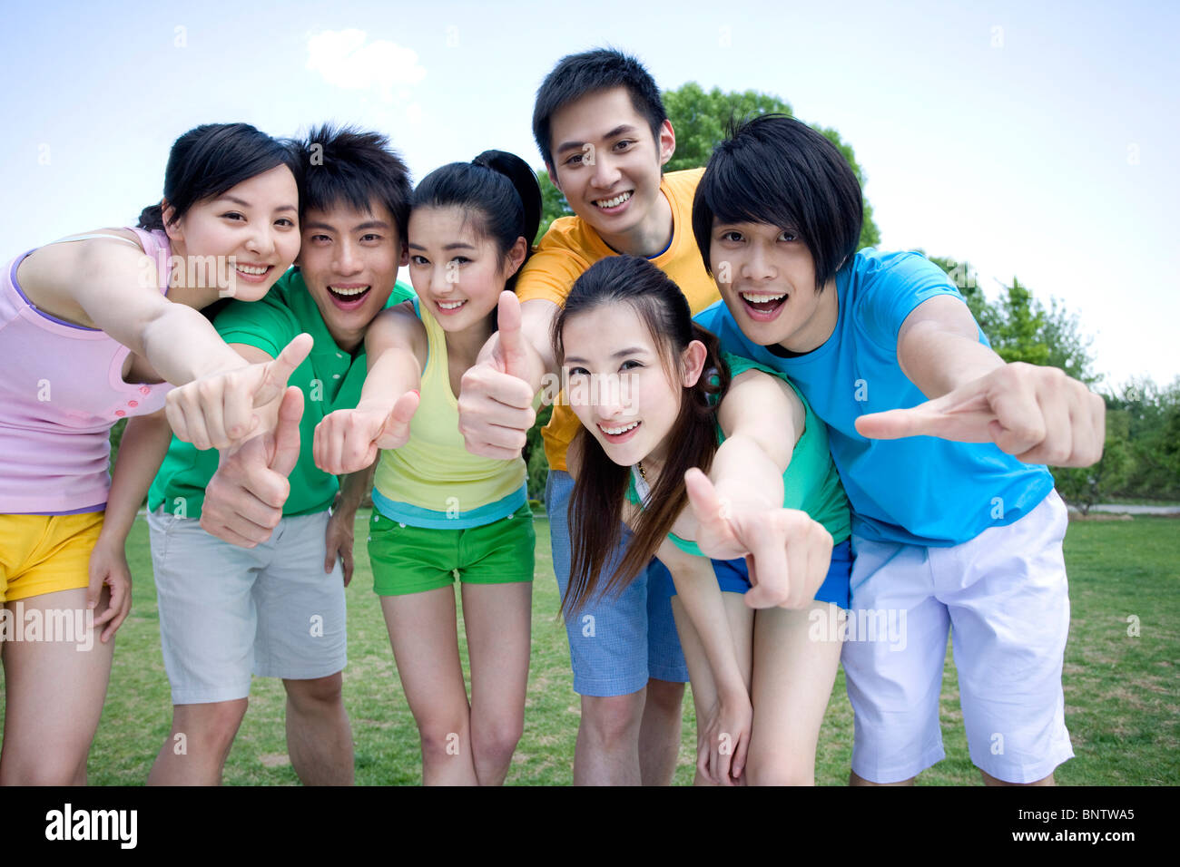 Portrait of a group of friends at the park Stock Photo - Alamy