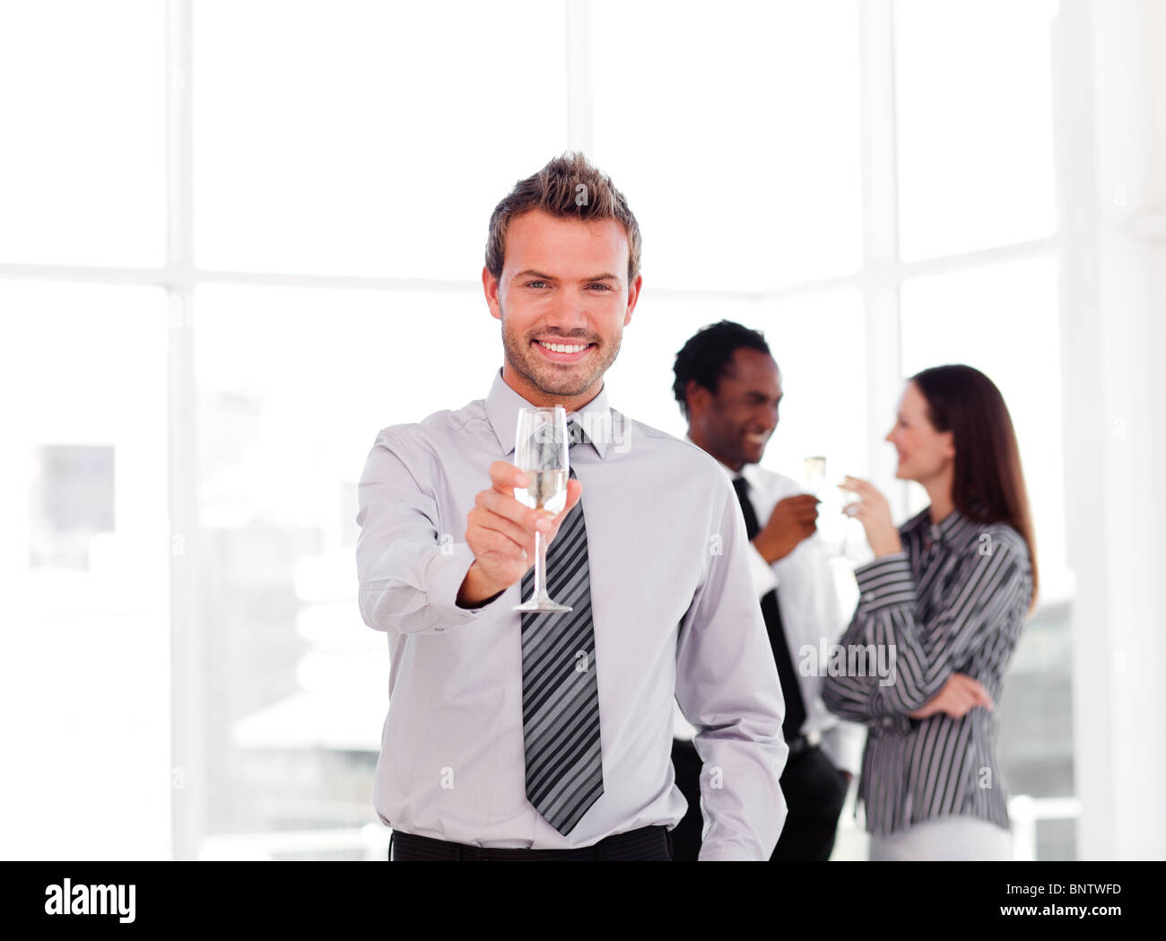 Business team drinking champgne in the office Stock Photo - Alamy