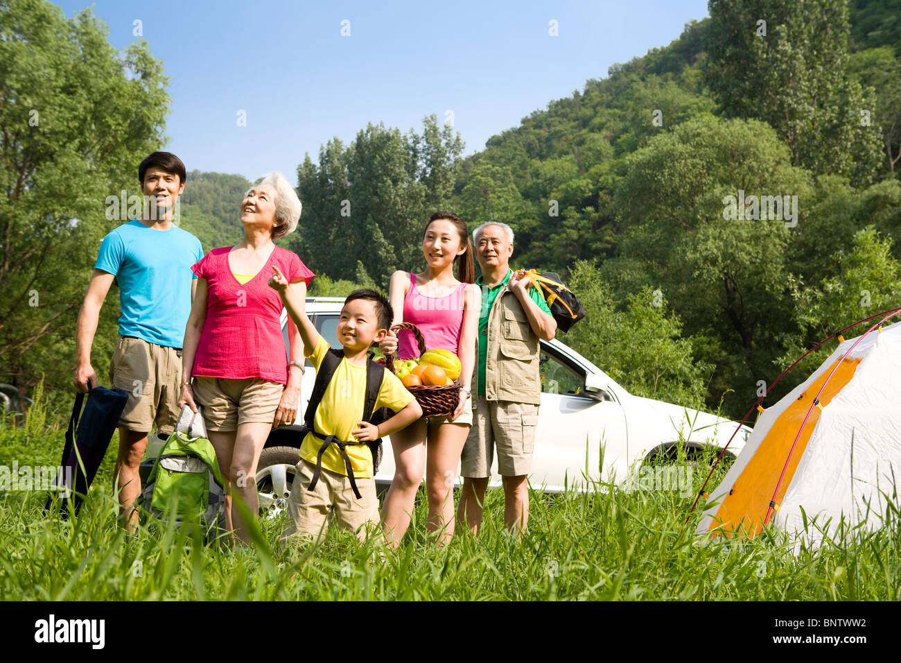 Family on a camping trip Stock Photo - Alamy