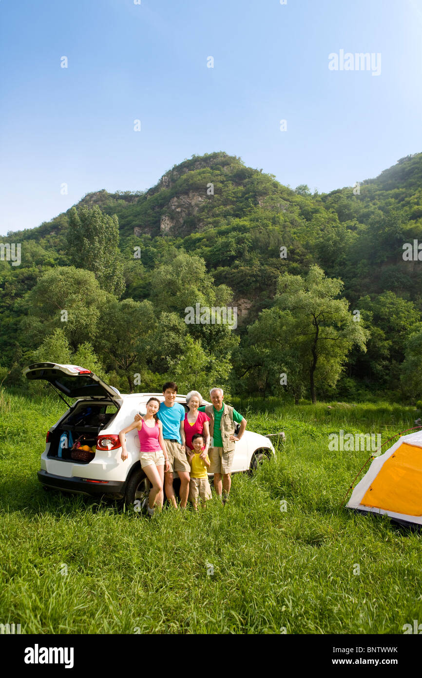 Family on a camping trip Stock Photo - Alamy