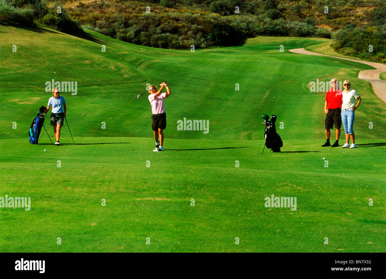 Sunlight hitting green hillside hi-res stock photography and images - Alamy