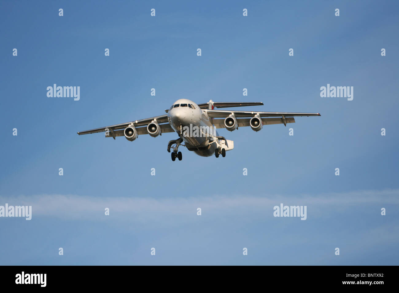 Avro RJ 100 Aircraft coming into land. airplane on approach Stock Photo ...
