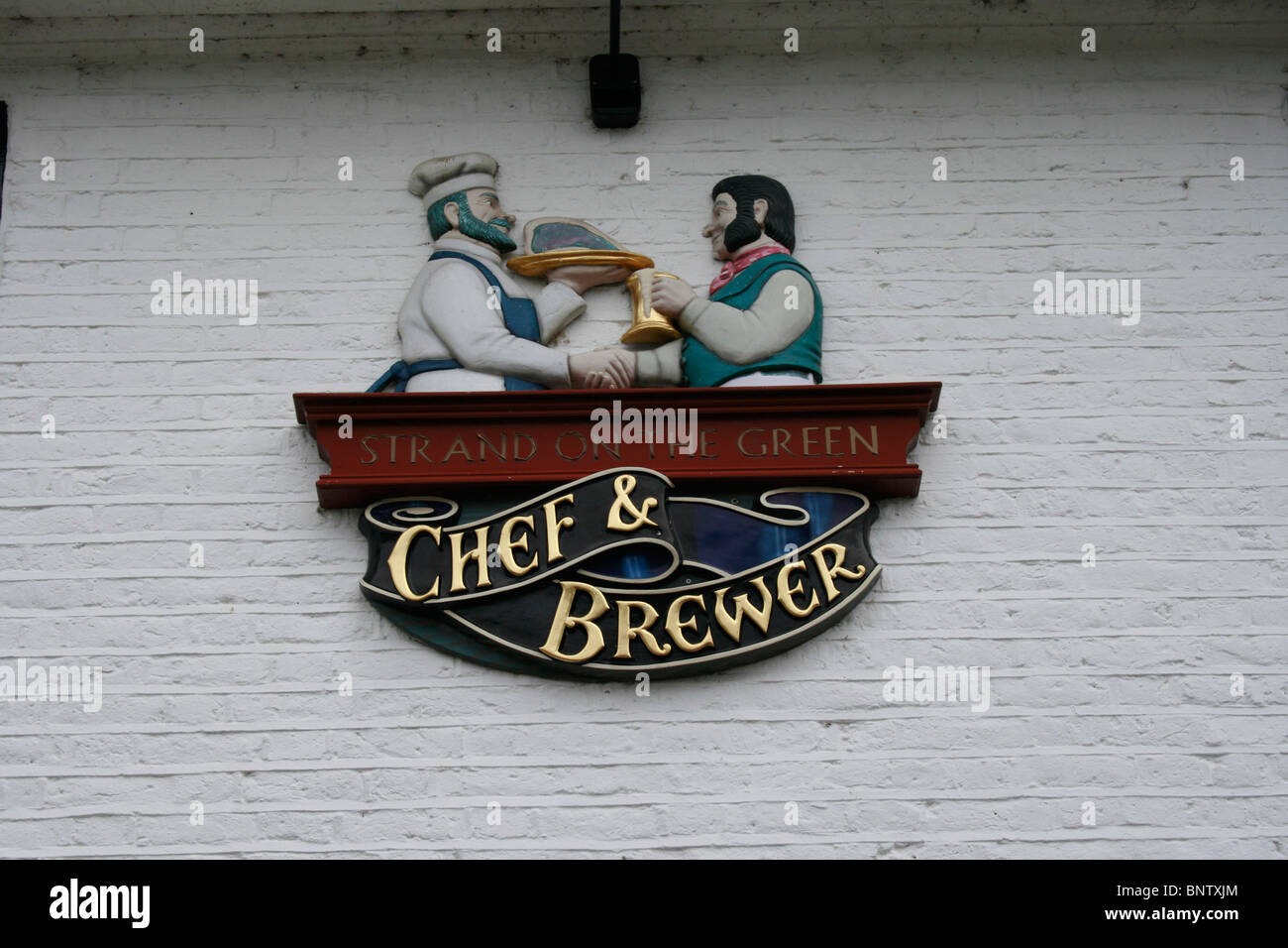 Pub sign of the Chef & Brewer in the Strand on the Green, London Stock ...