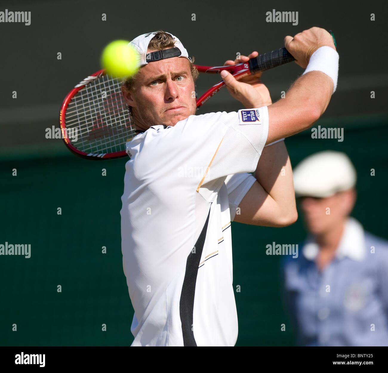 Lleyton Hewitt (AUS) in action during the Wimbledon Tennis ...