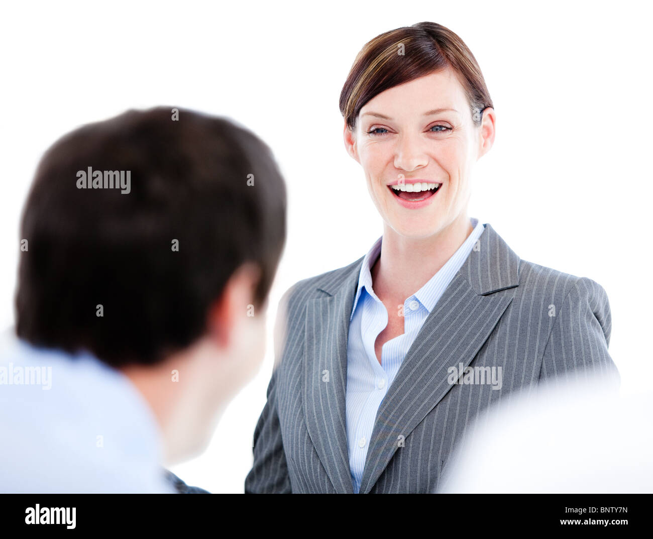 Business partners talking together in a office Stock Photo - Alamy