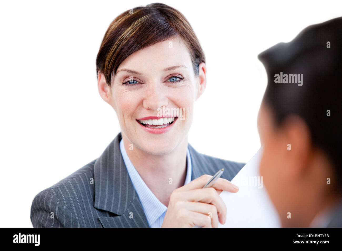 Portrait of a smiling business partners talking together Stock Photo ...