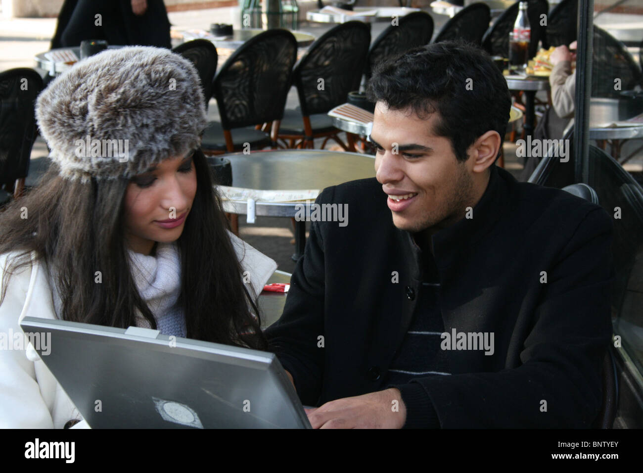 Two People at a Cafe Stock Photo - Alamy