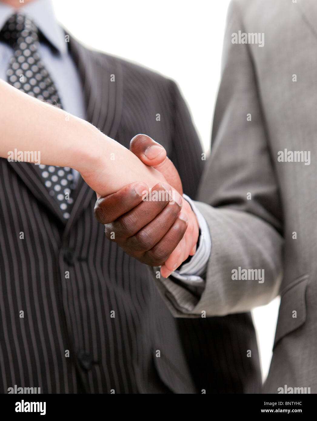 Close-up of a handshake between two colleagues Stock Photo - Alamy