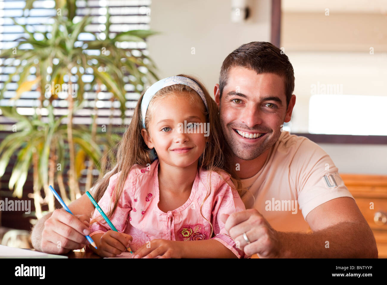 Brother sister doing drawing work hi-res stock photography and images - Alamy