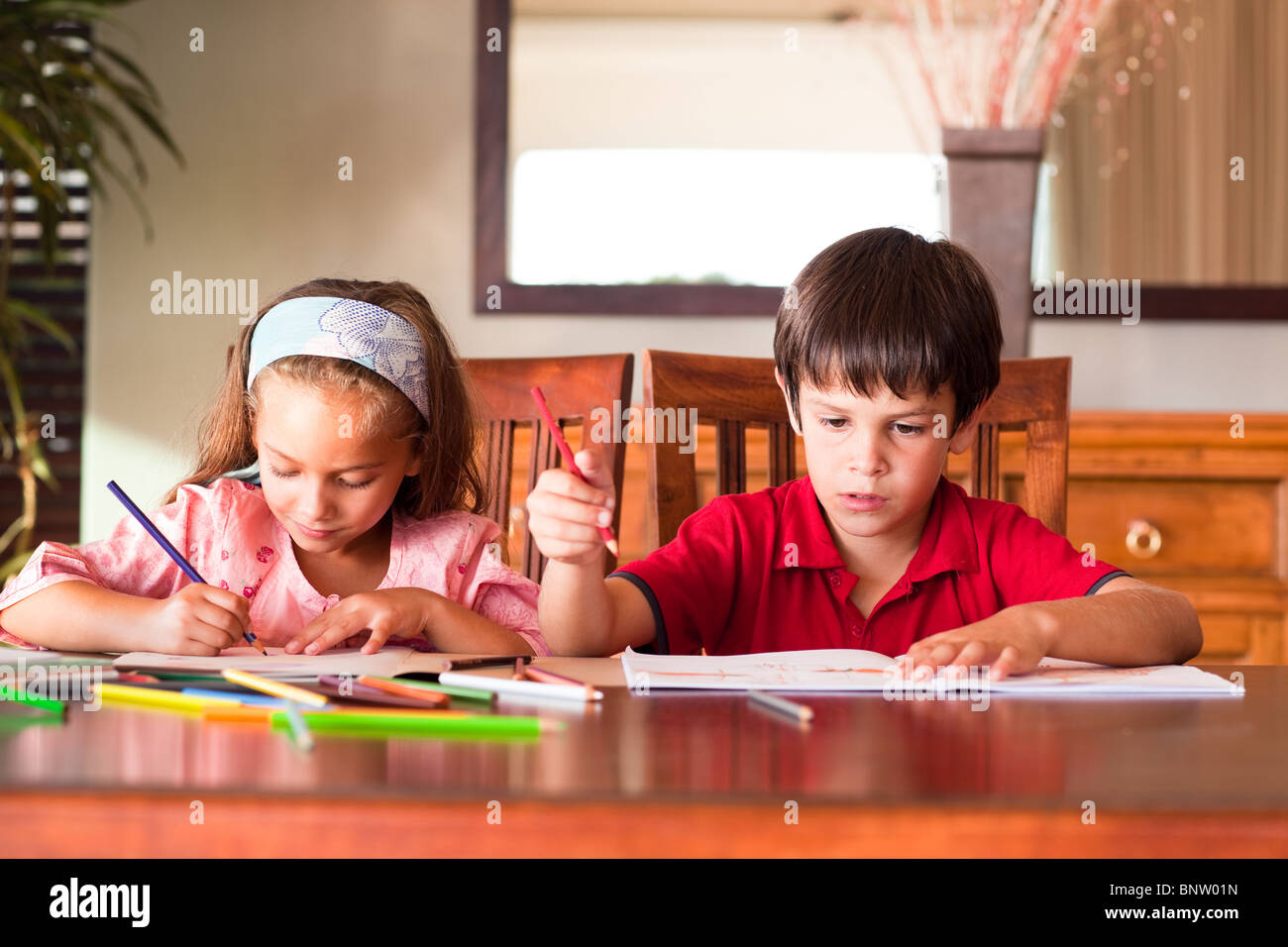 Children doing homework Stock Photo - Alamy