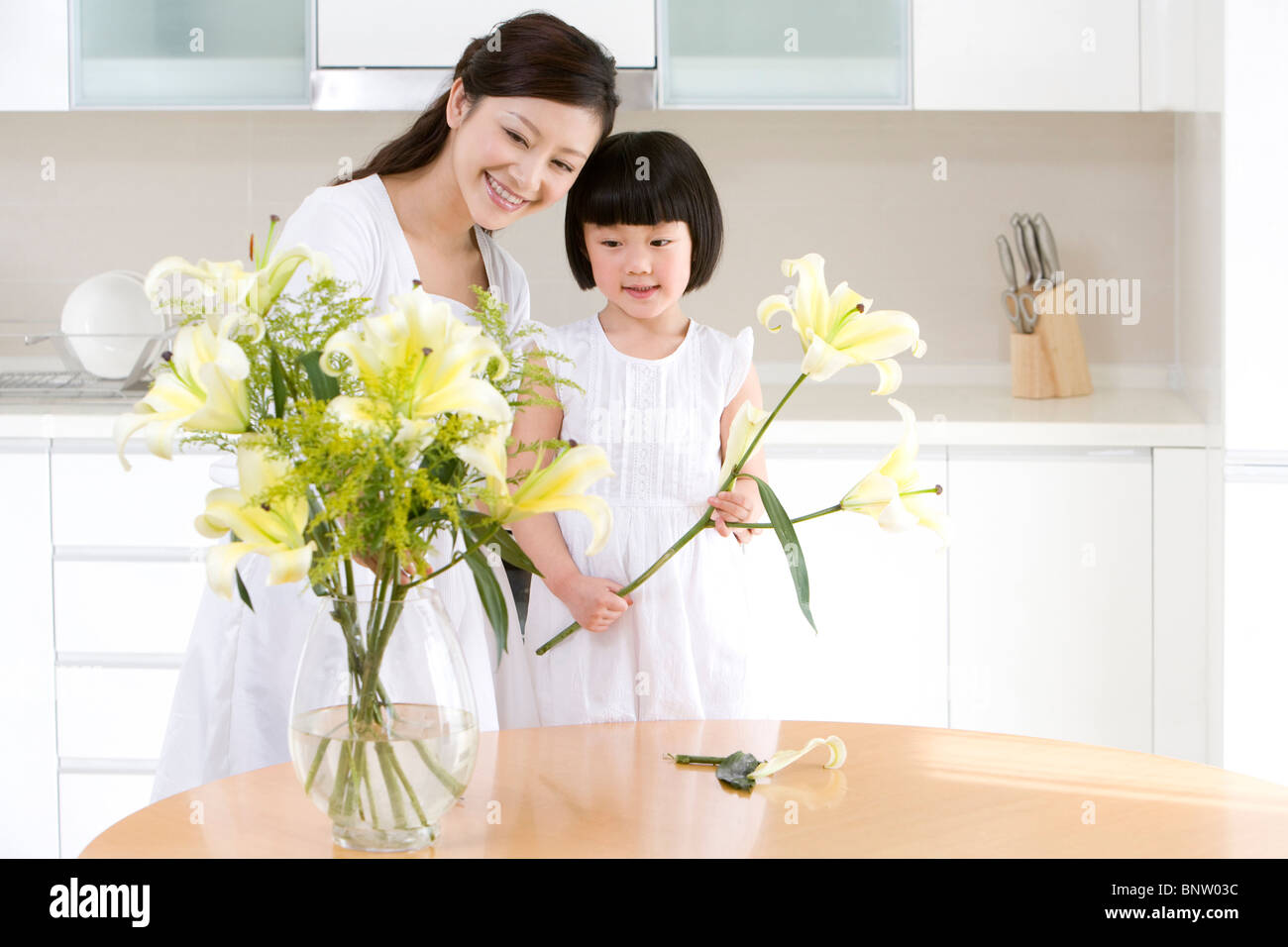 Kitchen lily flowers vase hi-res stock photography and images - Alamy