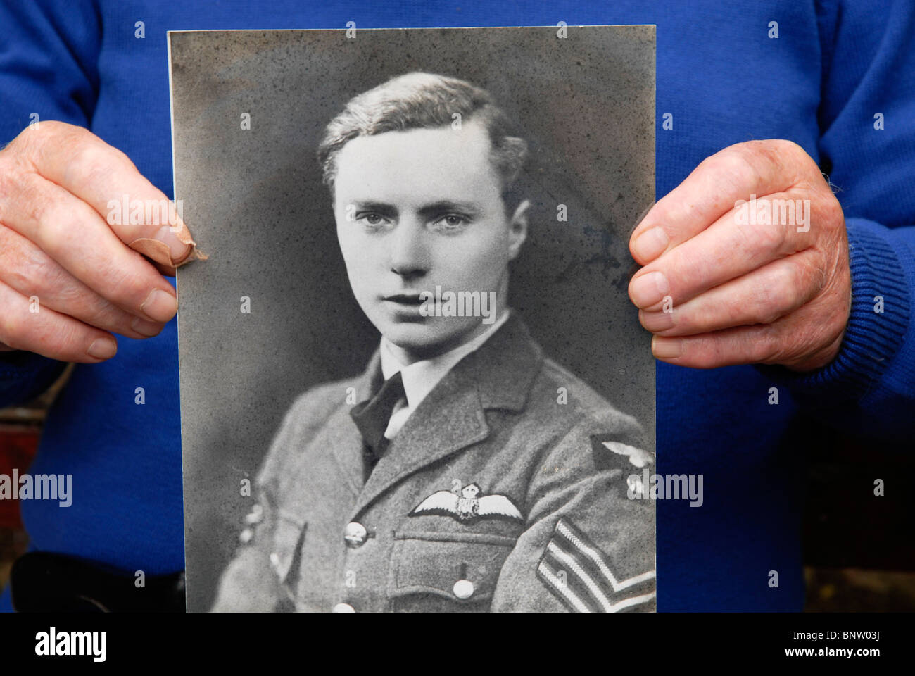 Former Spitfire pilot Howard Squire with a photo of himself as a Flt ...