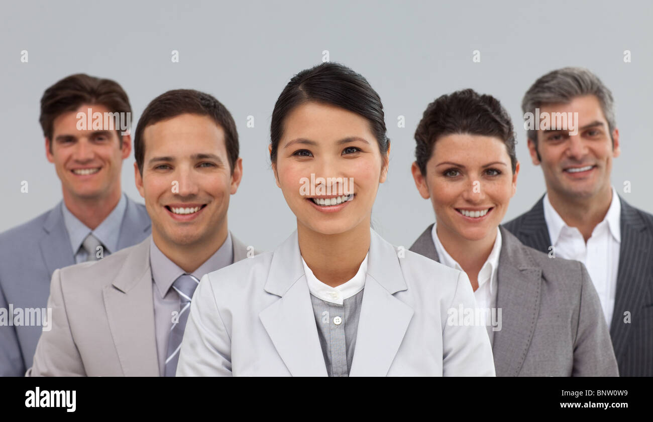 Business people standing together Stock Photo - Alamy