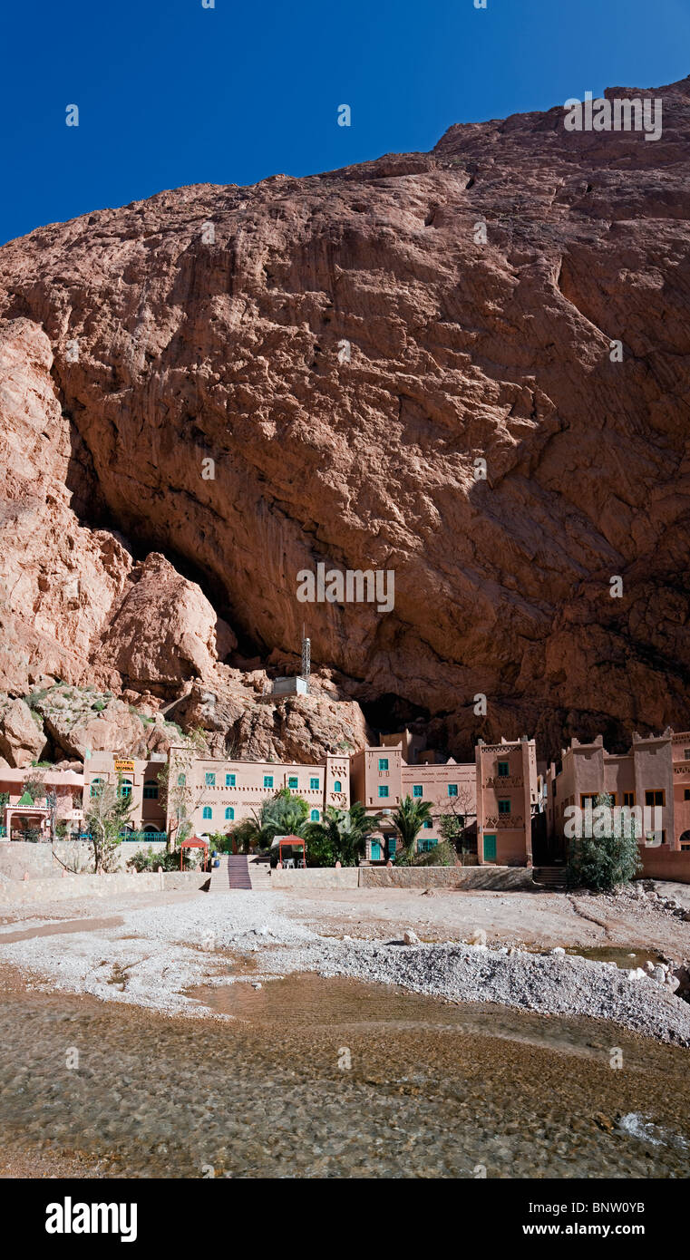Todra Gorge and Hotel Yasmina below over-hanging cliffs, near Dades ...