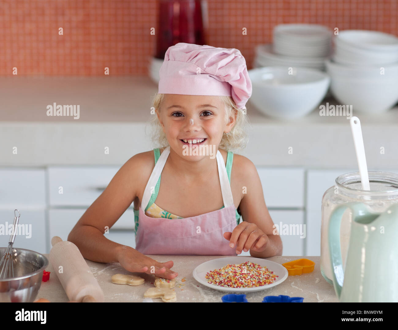 Lovely daughter baking at home Stock Photo - Alamy