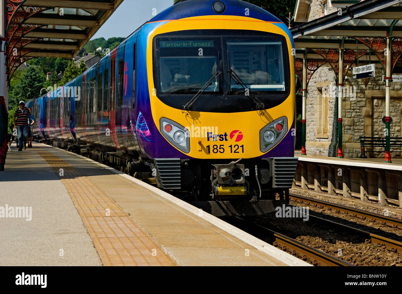 First train waiting at Grange-over-Sands railway station in summer ...
