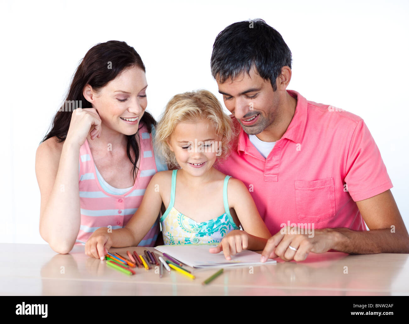 Lovely family drawing together Stock Photo - Alamy