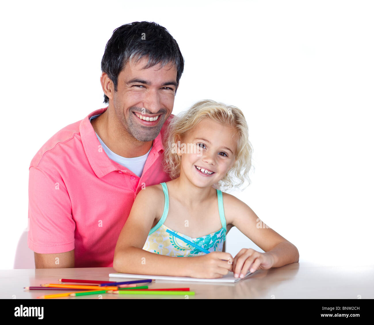 Handsome father drawing with his daughter Stock Photo - Alamy