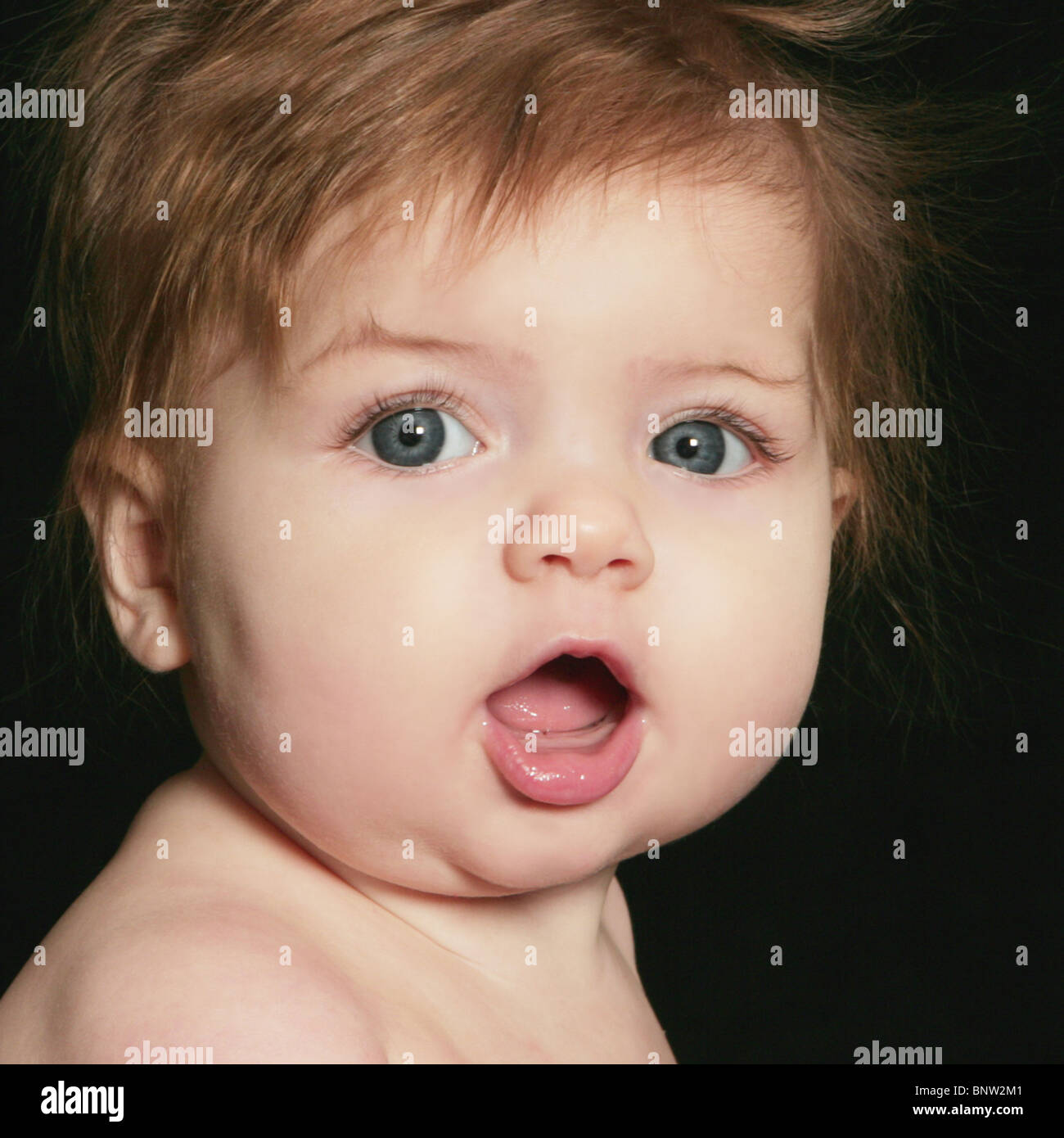 Baby face close-up redhead Stock Photo - Alamy