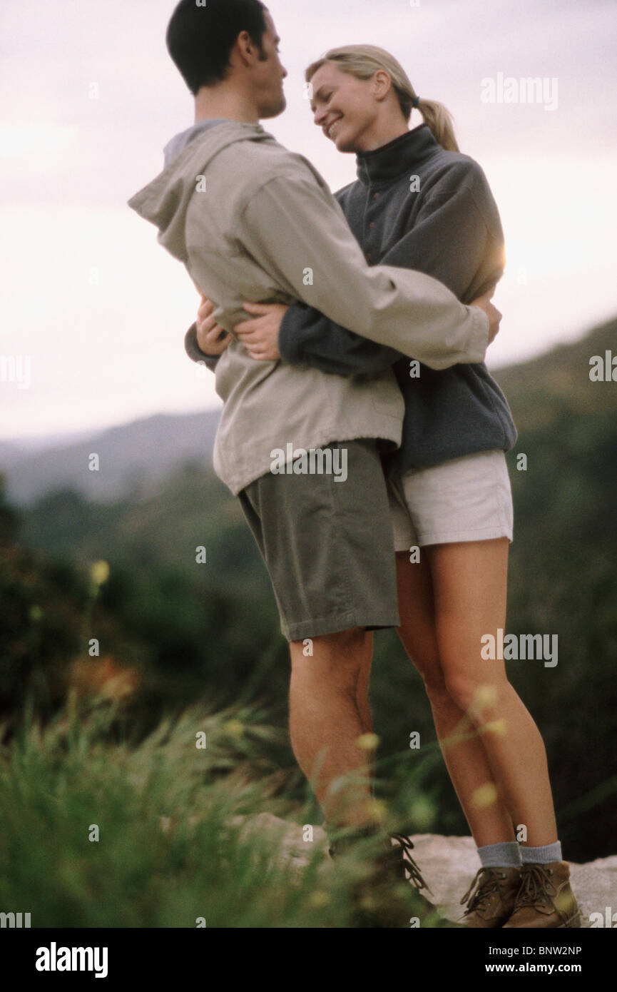 Couple embracing outdoors Stock Photo - Alamy Couple embracing outdoors Stock Photo - Alamy