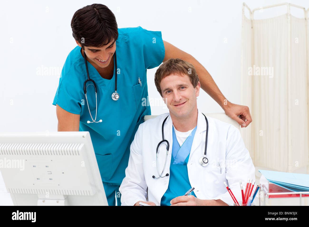 Two doctors working together Stock Photo - Alamy