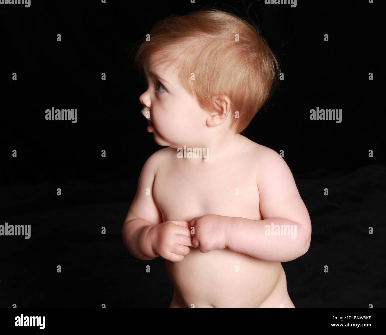 toddler looking sideways profile Stock Photo - Alamy
