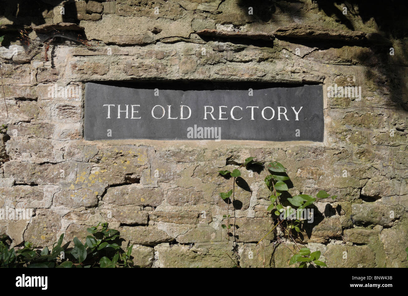 'The Old Rectory' sign in stone outside a property in Puncknowle ...
