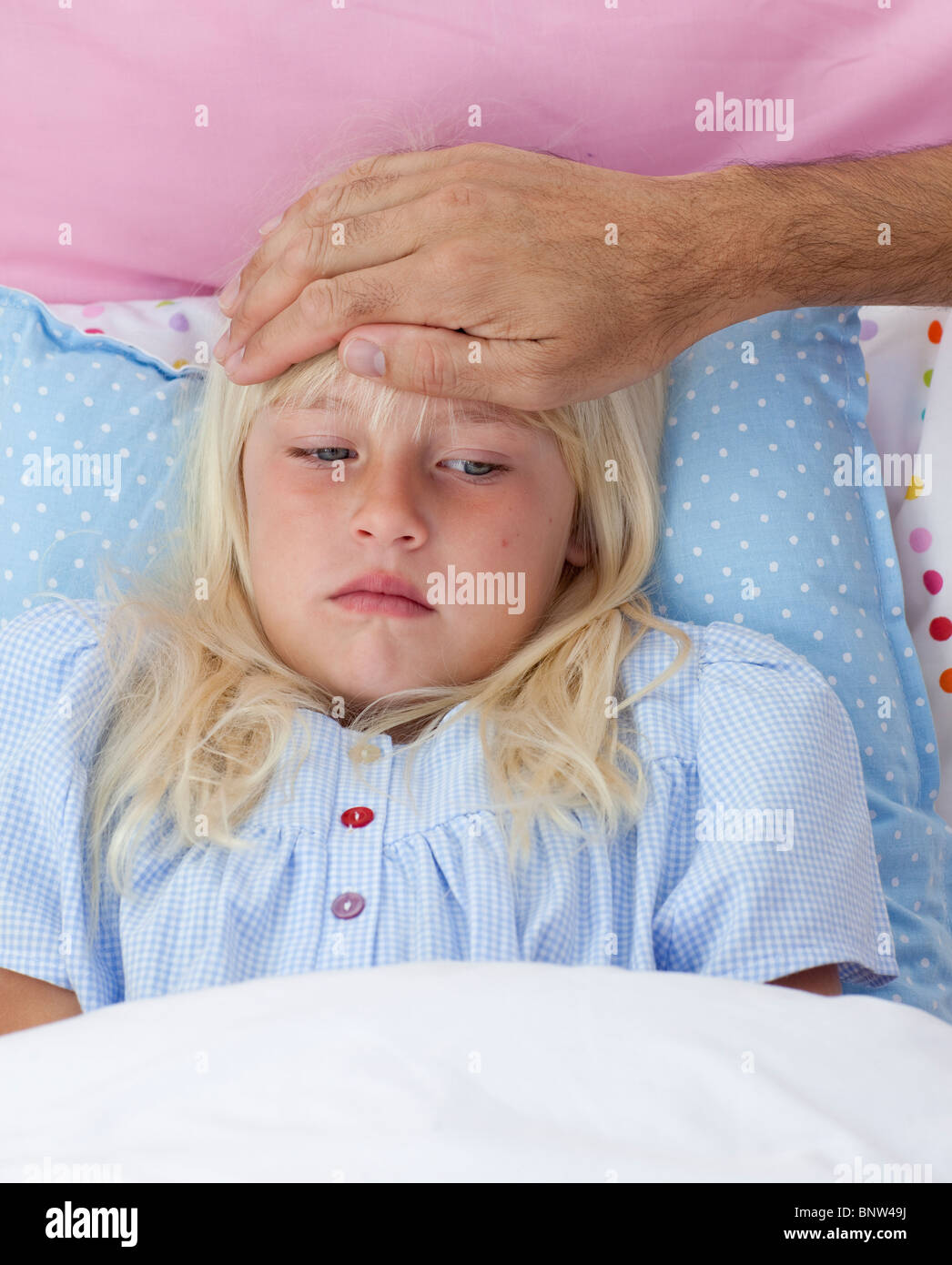 Sick girl in bed having flu Stock Photo - Alamy