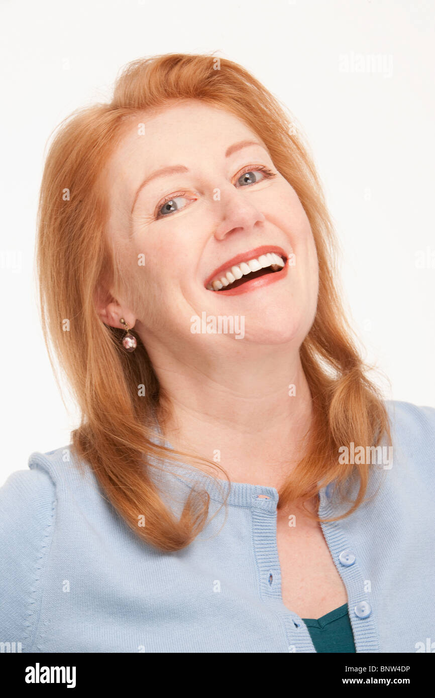 Happy red haired woman Stock Photo - Alamy