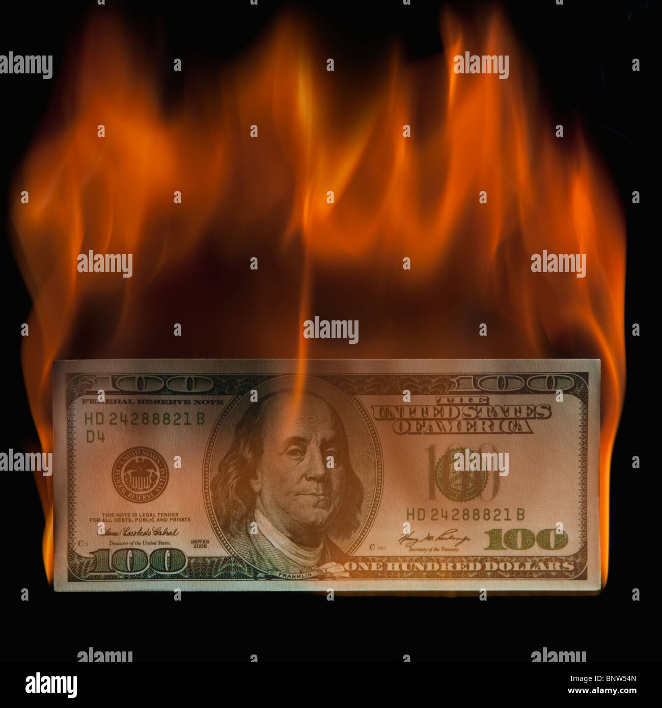 Burning 100 dollar bill Stock Photo - Alamy