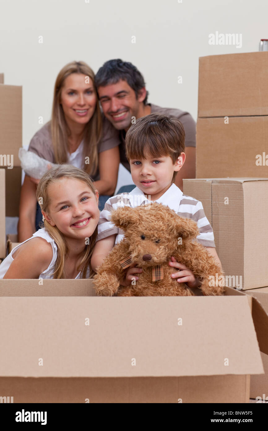 Portrait children unpacking boxes hi-res stock photography and images ...