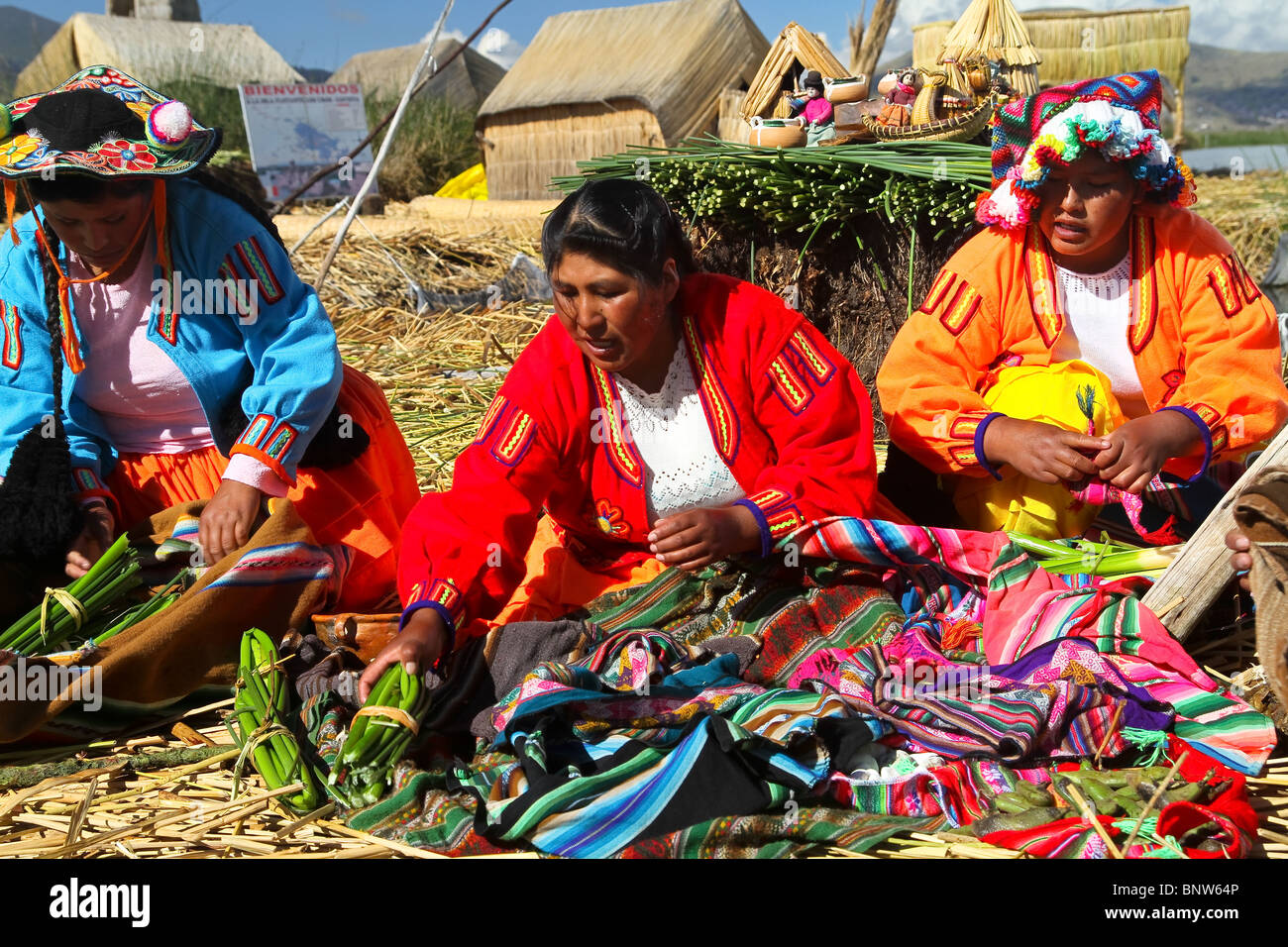 Uros people living on the floating islands of the Lake Titicaca in Peru ...