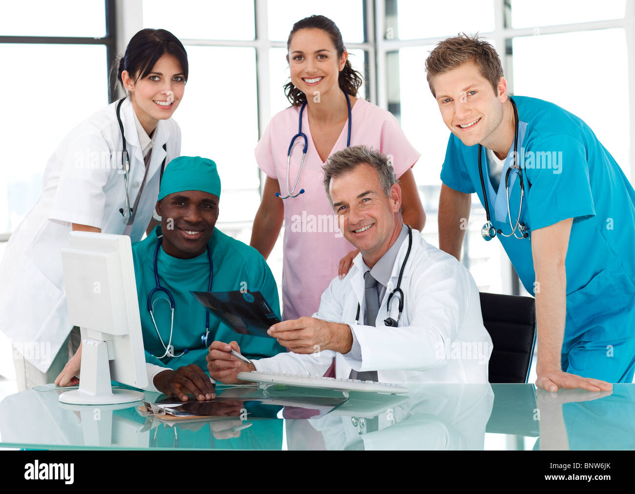 Group of young doctors in a meeting at hospital Stock Photo - Alamy