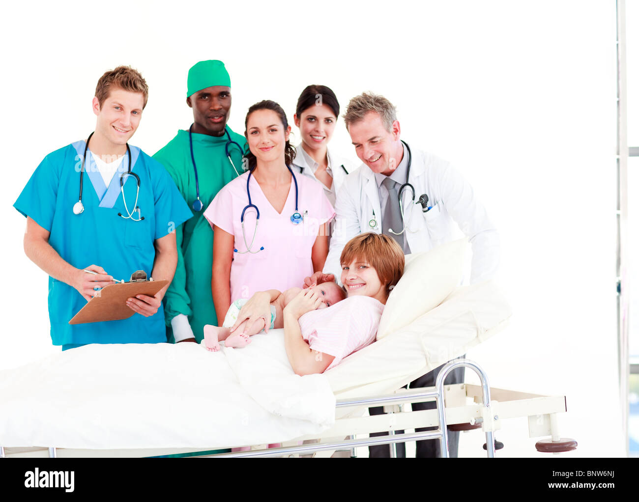 Doctors with a mother and her newborn baby Stock Photo - Alamy