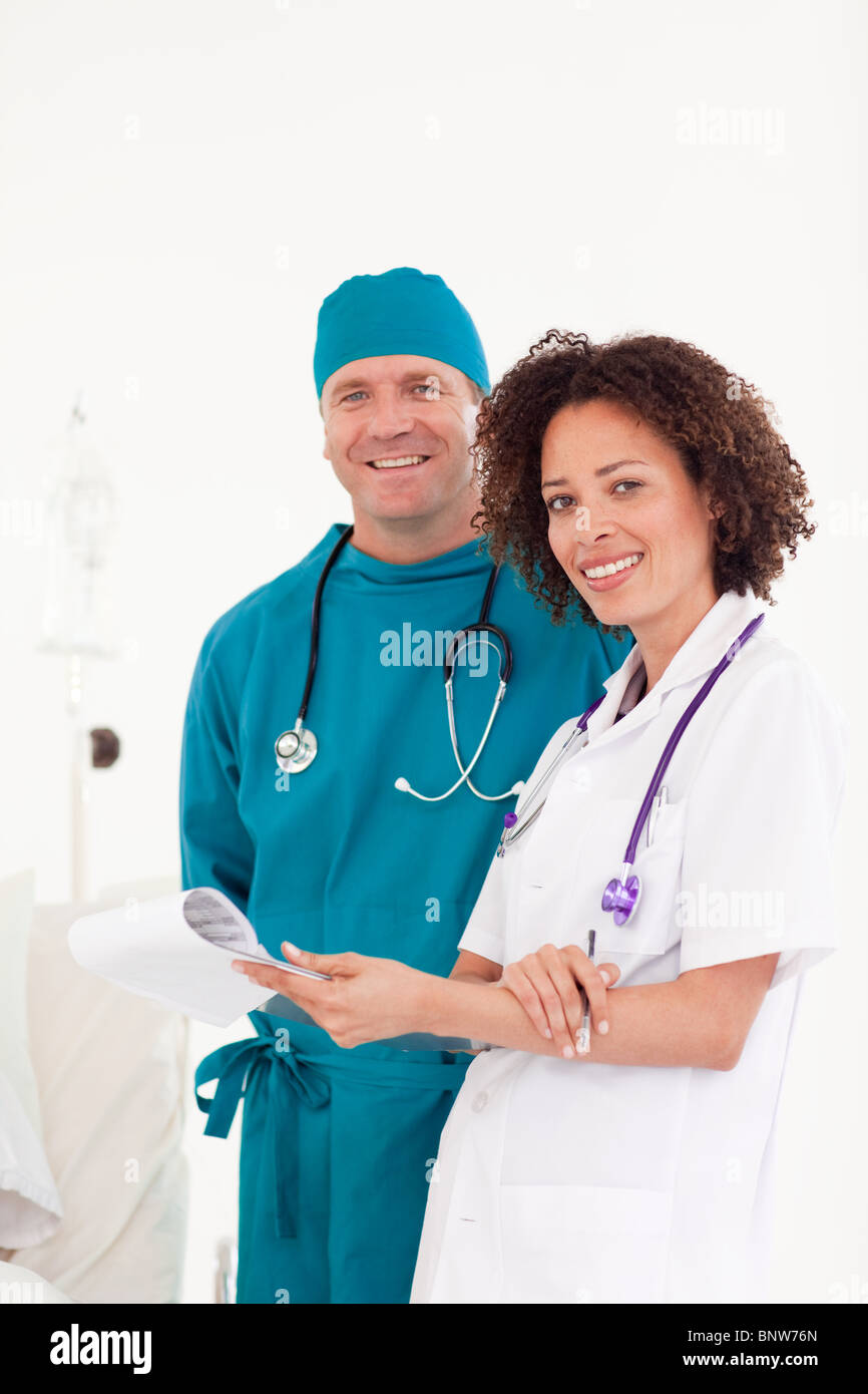 Team of doctors looking at the camera Stock Photo - Alamy