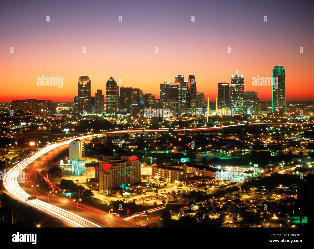 Highway traffic lights circling Dallas skyline at dusk Stock Photo - Alamy