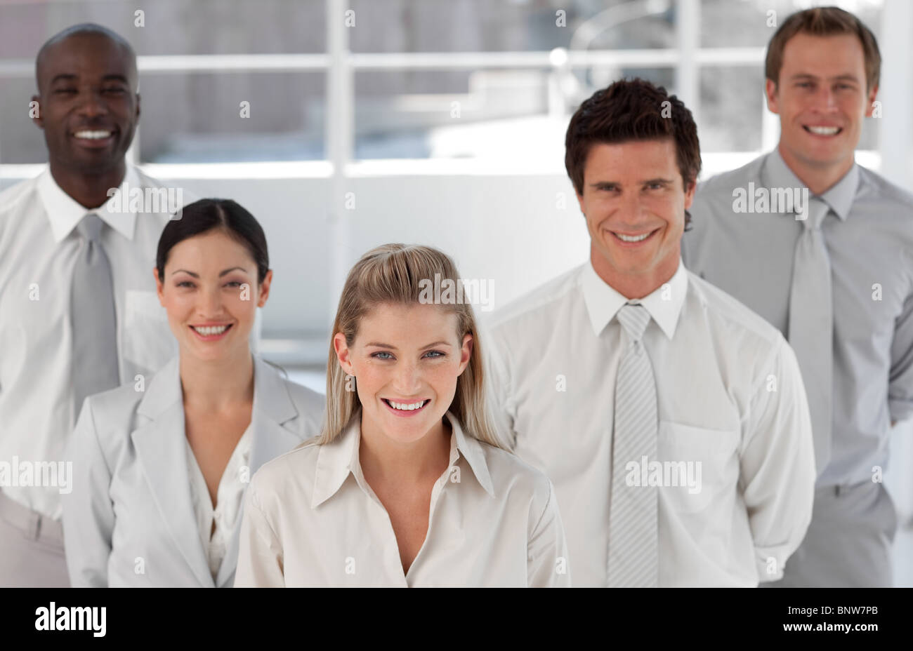 Business Group of Five people looking at camera Stock Photo - Alamy