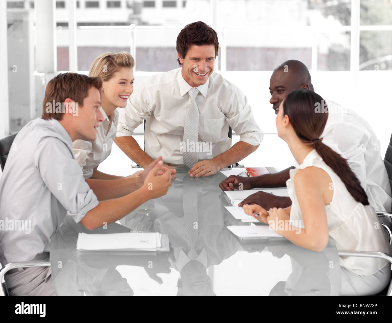 Business Group working and interacting with each other Stock Photo - Alamy