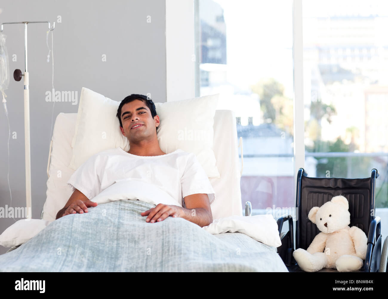 Patient resting in bed Stock Photo - Alamy