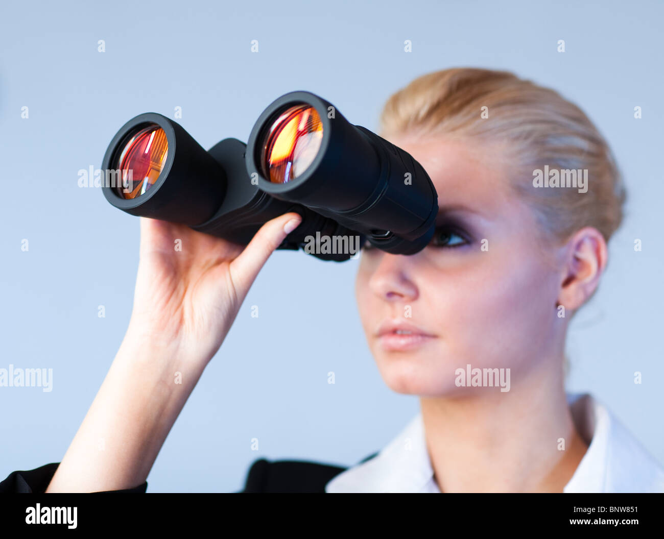 Woman binoculars orange hi-res stock photography and images - Alamy