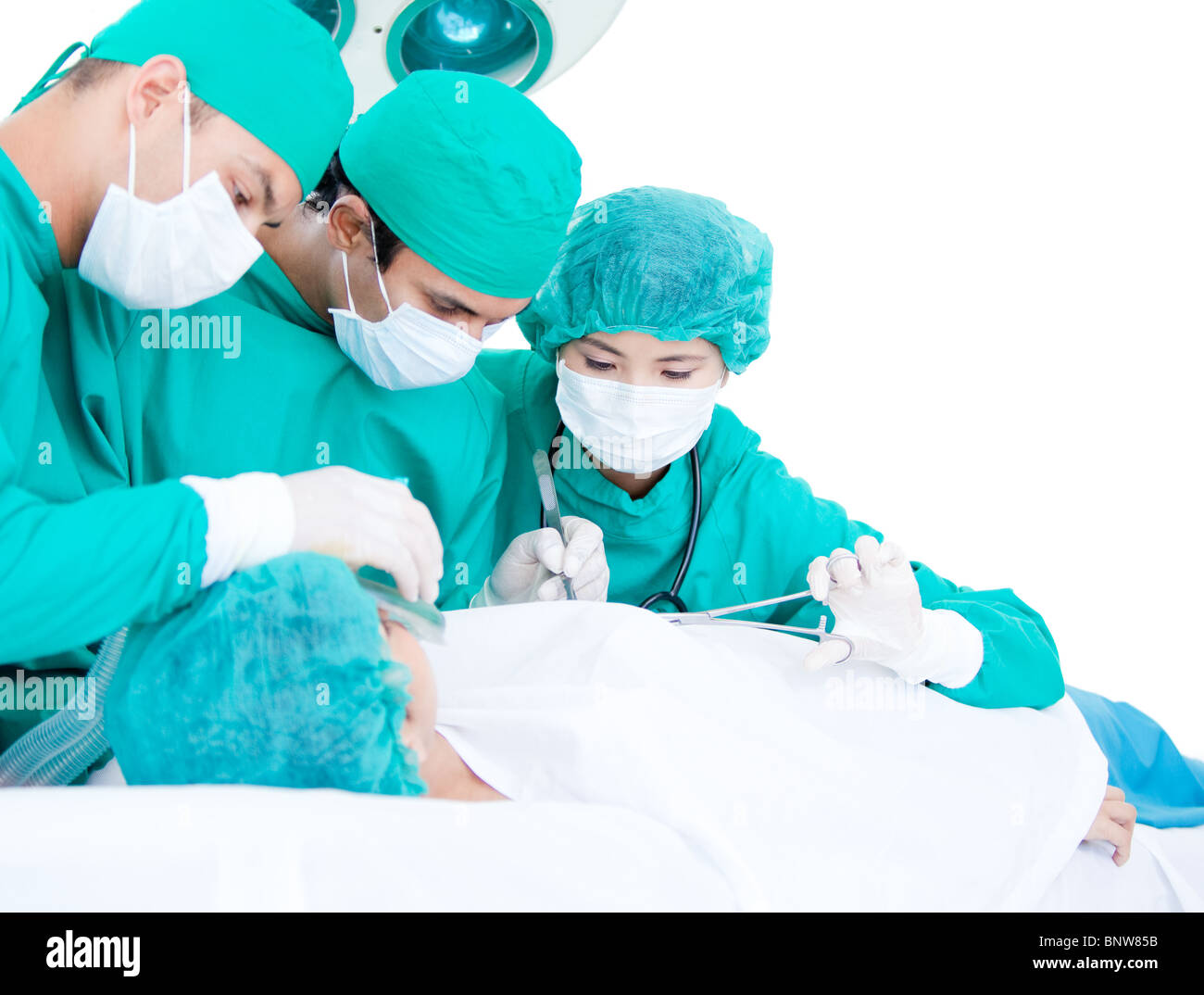 Medicalteam making an operation using surgery equipment on a patient ...