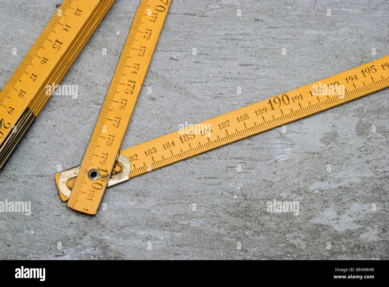 folding ruler on concrete Stock Photo - Alamy