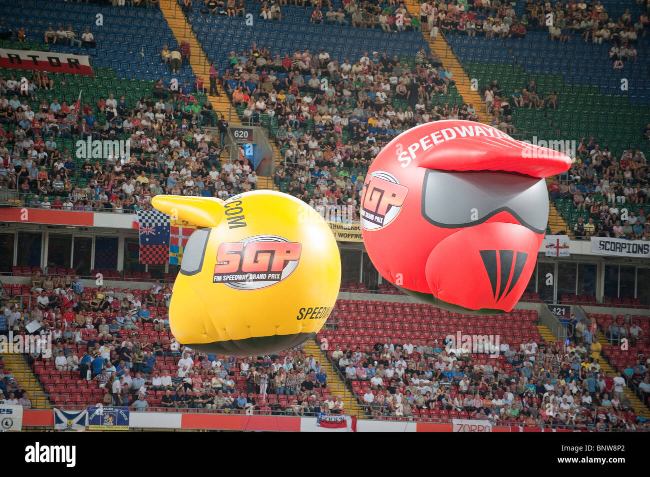 Red and Yellow inflatable helmets at the 2010 British Speedway Grand ...