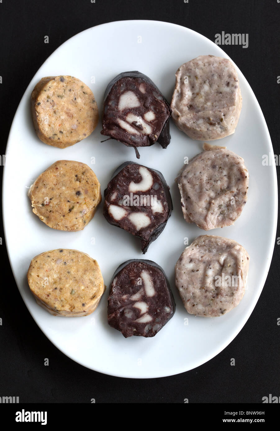 Plate of black white and chilli pudding - An example of the strange or ...
