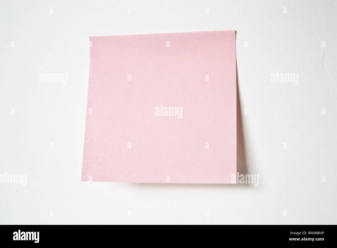 pink postit post-it note memo office Stock Photo - Alamy