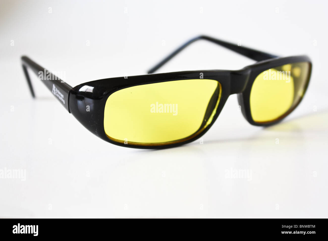 yellow glasses black frame Stock Photo - Alamy